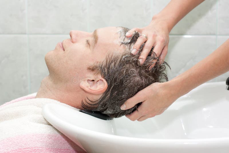 Getting Hair Washed in a Salon Stock Photo - Image of young, female ...