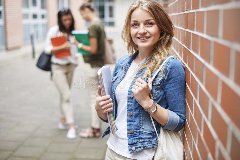 Blonde Student with Her Friends Stock Image - Image of holding ...