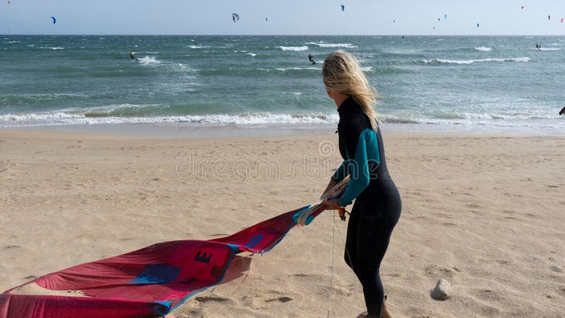 Blonde Woman at a Beach Preparing for Kitesurfing Stock Photo - Image ...