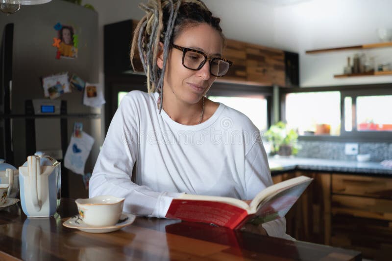Blonde Woman with Dreadlocks Reading a Book Stock Photo - Image of ...
