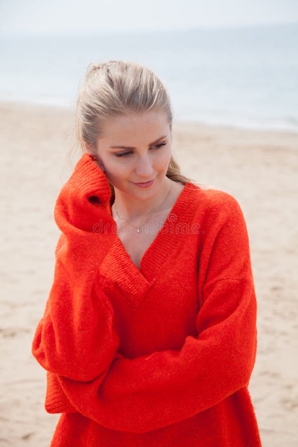 Beautiful Blonde Woman on an Empty Beach by the Sea Walks Alone Stock ...