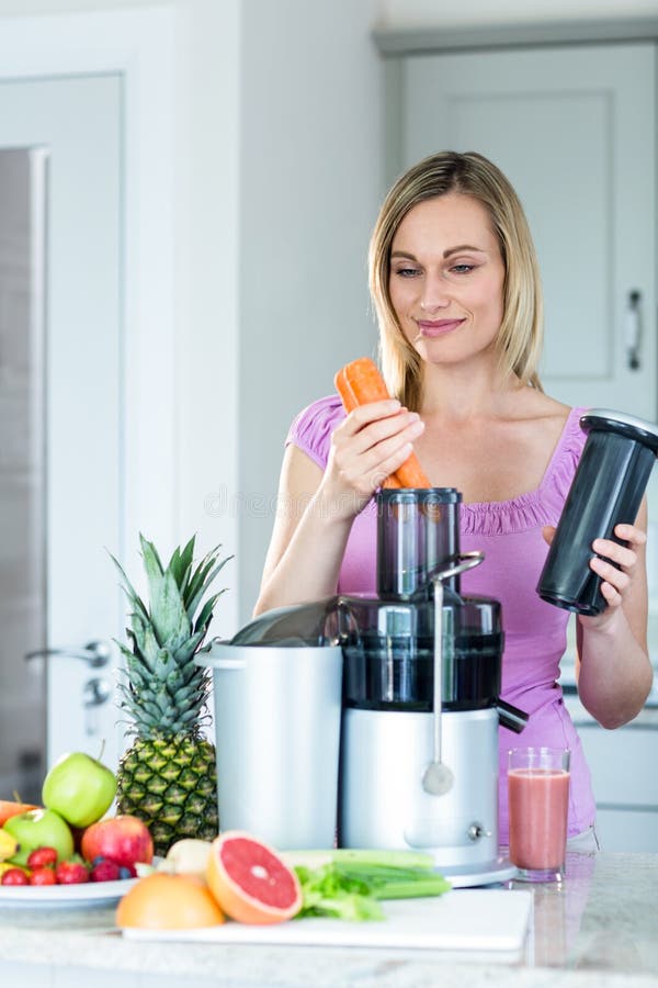 Blonde Woman Preparing a Smoothie in the Kitchen Stock Image - Image of ...