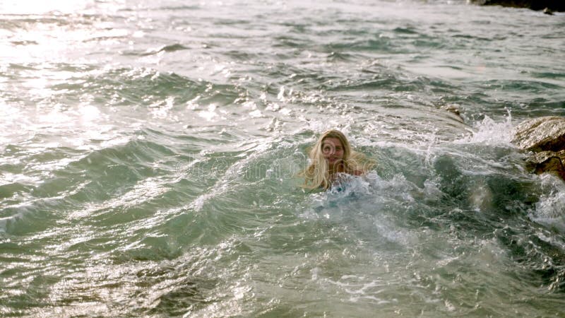 Blonde Woman Flips Long Hair On Tropical Beach Backdrop Beauty Model