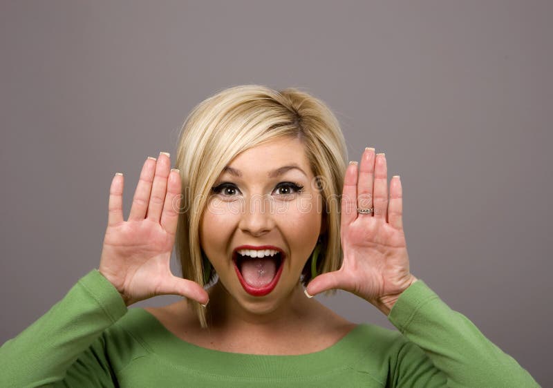 Blonde Yelling through Hands Stock Photo - Image of girl, model: 4918698