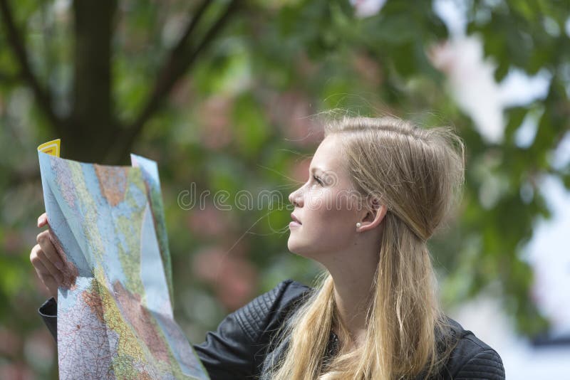 Blonde and Young Girl Looking on a Map Stock Image - Image of ...