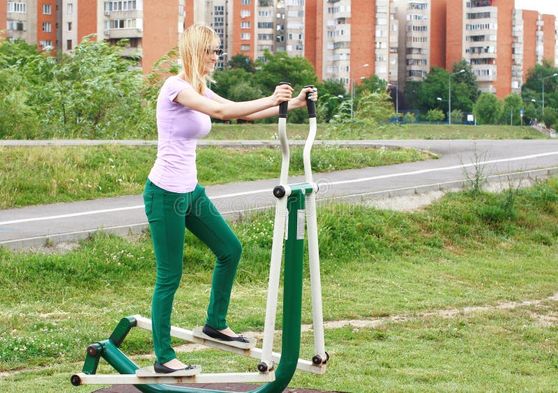 Blonde Young Woman Working Out Outdoors Stock Image - Image of blonde ...