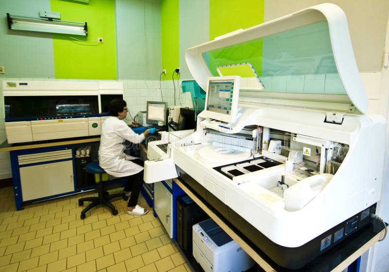 Laboratory man and machine stock photo. Image of instrument - 2333510