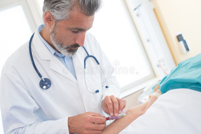 Blood collection at doctor stock image. Image of people - 101668573