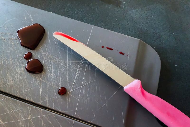 Blood on a Cutting Board with Knife in the Background Stock Image ...