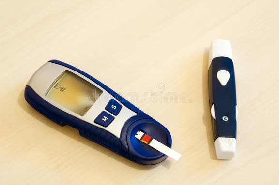 Blood drop on glucometer stock image. Image of strips - 4204317
