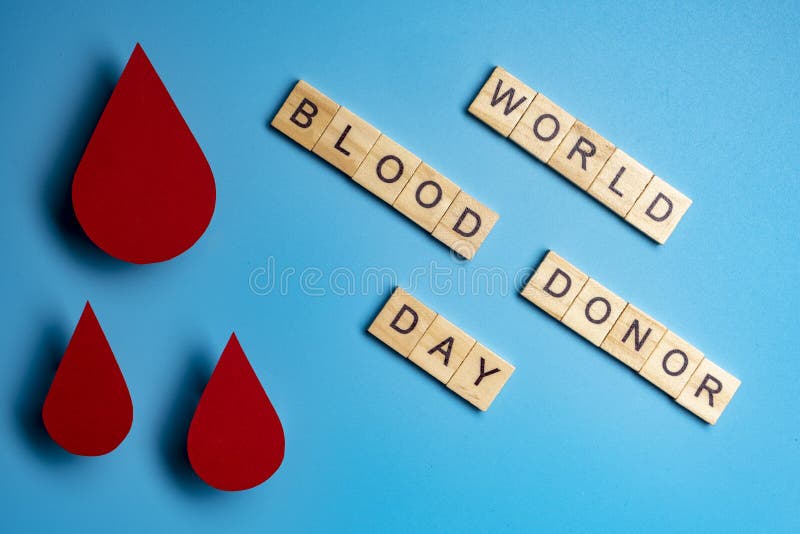 Blood Drop Symbol on Blue Background. Text of Blood Donor Day Stock ...