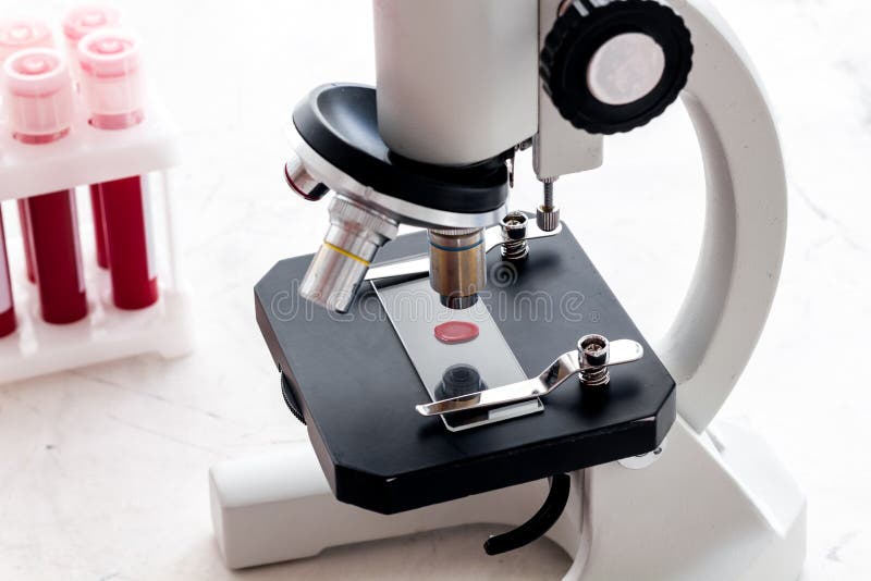Blood Drop Under Microscope On White Background Stock Image - Image of ...