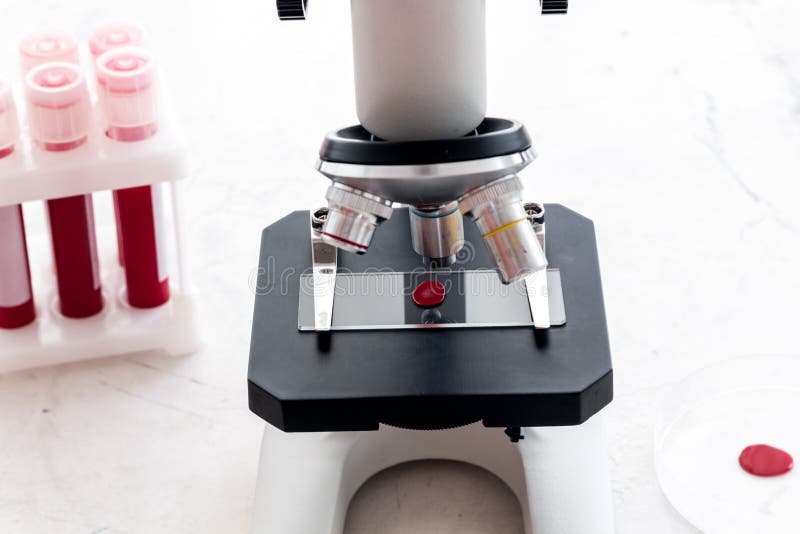 Blood Drop Under Microscope On White Background Stock Image - Image of ...