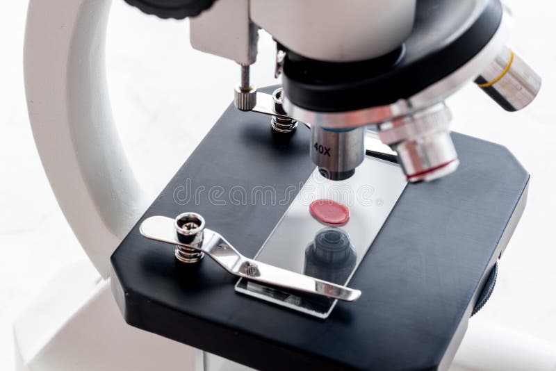 Blood Drop Under Microscope On White Background Stock Image - Image of ...
