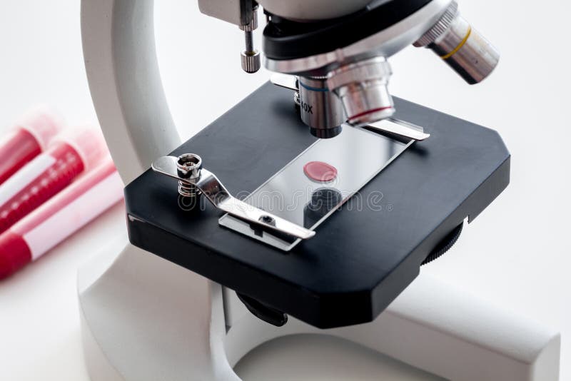 Blood Drop Under Microscope On White Background Stock Image - Image of ...