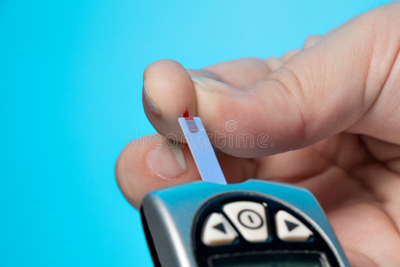 Blood Glucose Meter To Check the Blood Sugar Level Stock Photo - Image ...