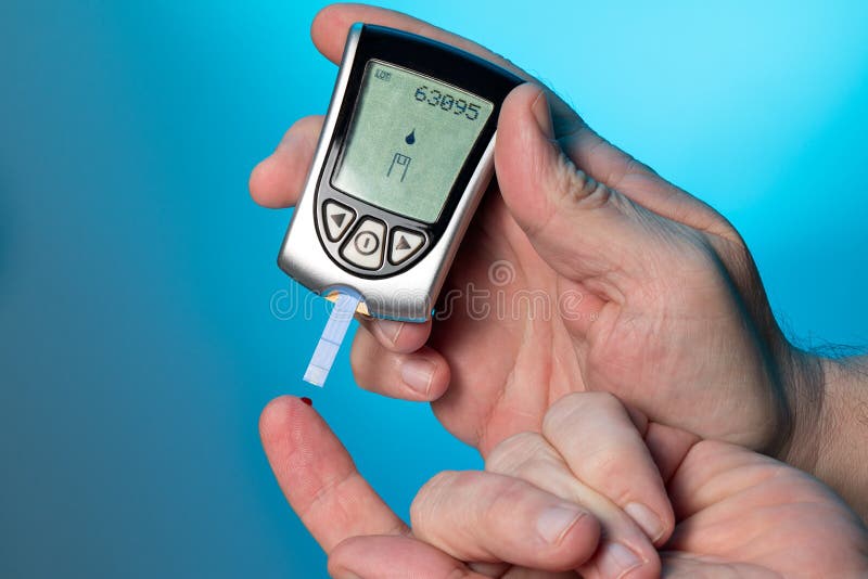 Blood Glucose Meter To Check the Blood Sugar Level Stock Image - Image ...