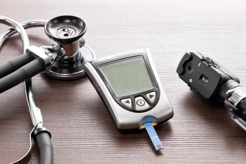 Blood Glucose Meter To Check the Blood Sugar Level Stock Photo - Image ...