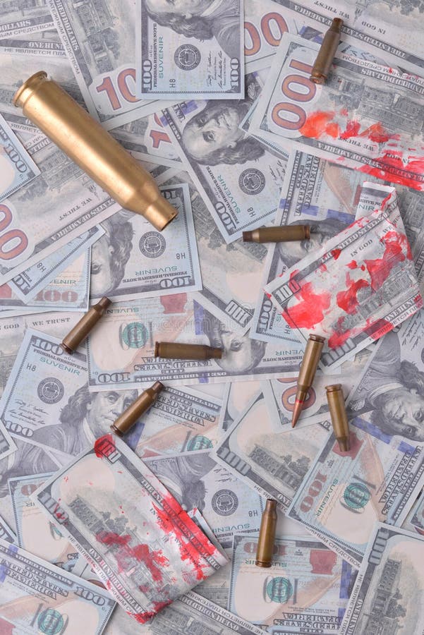 Blood Money of War. Cartridges with Blood in Dollar Bills Stock Image ...