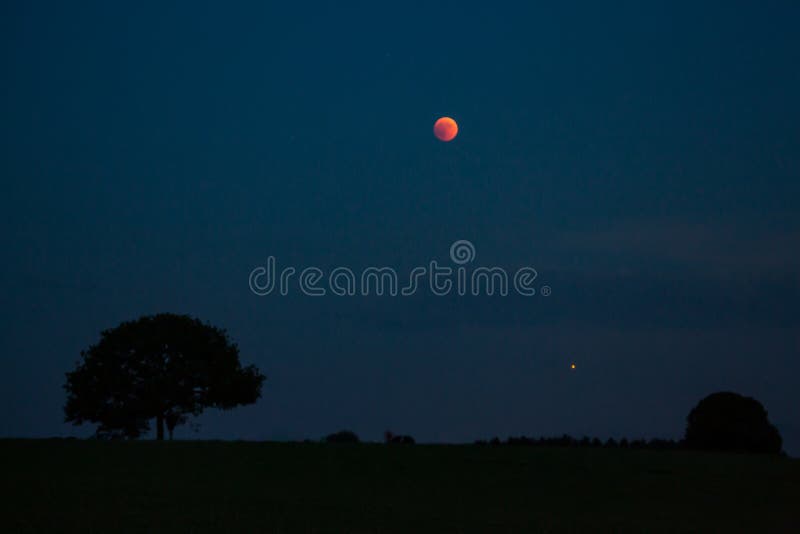 Blood Moon and Mars Glowing during Total Lunar Eclipse Over Germany ...