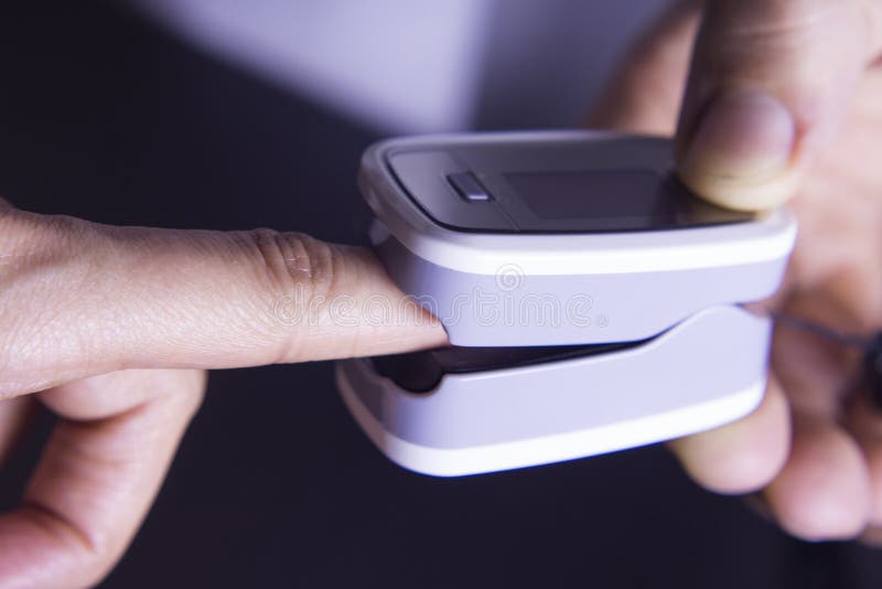 Blood oxygen finger meter stock image. Image of cardiology - 179841673