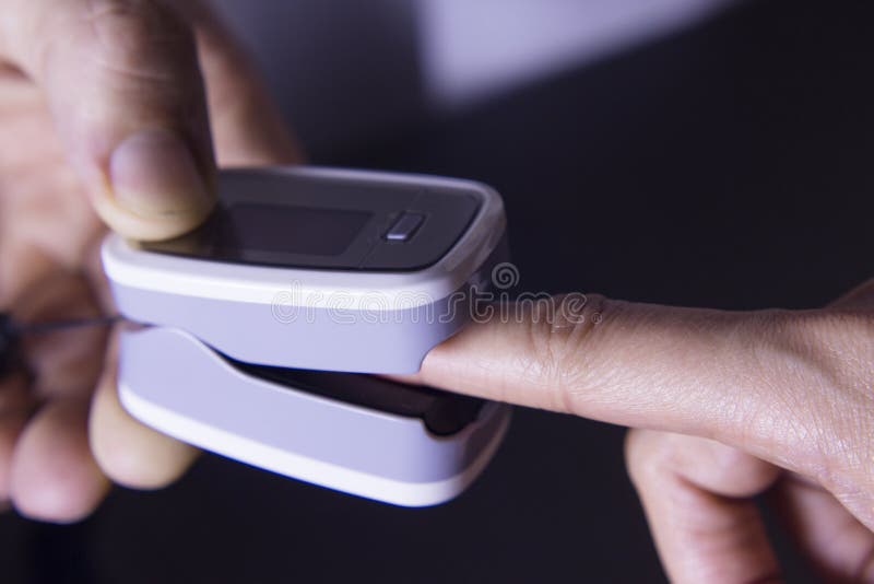 Blood oxygen finger meter stock photo. Image of cardiology - 180953226