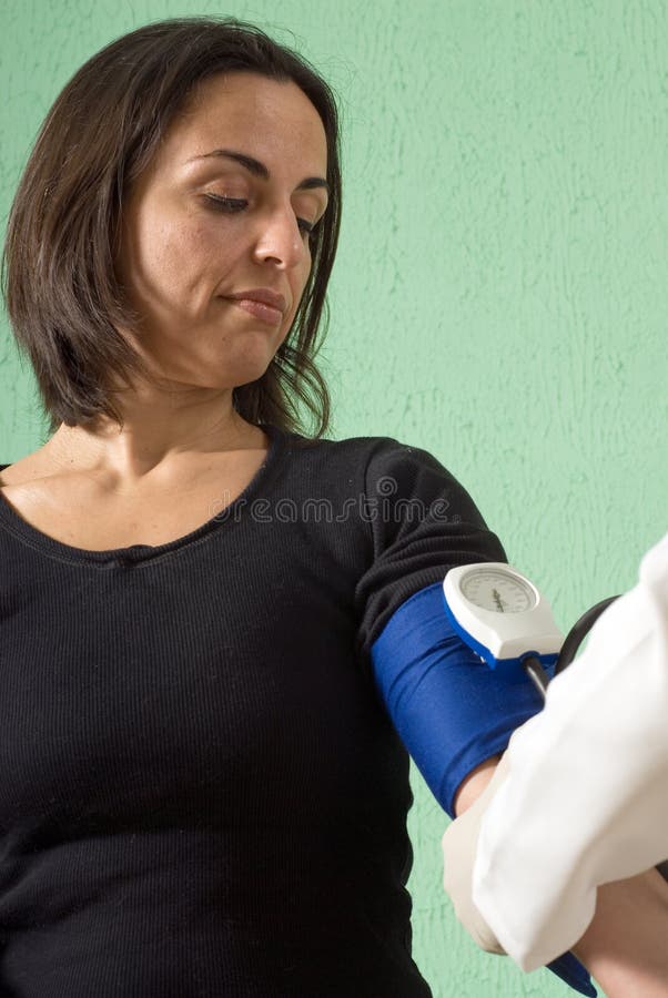 Blood Pressure Check-up - Vertical Stock Photo - Image of serene ...