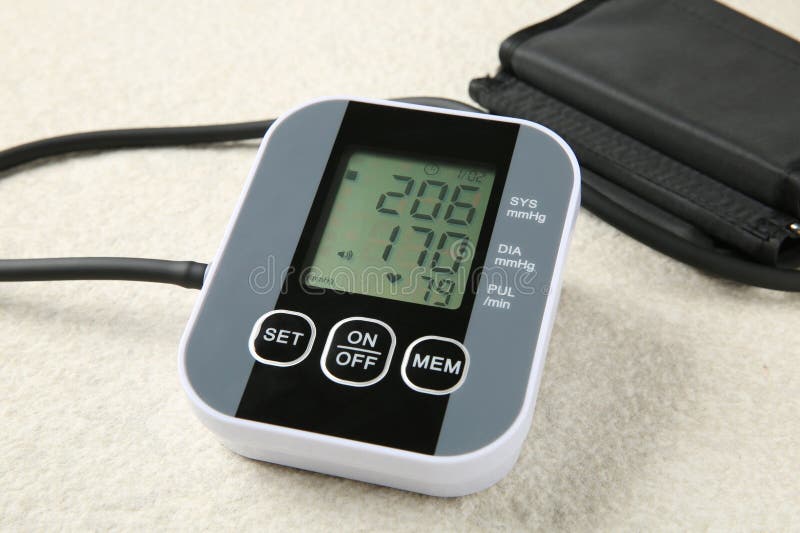 Blood Pressure Measuring Device on Light Textured Background, Closeup ...