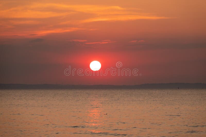 A Blood Red Sun Sets Over the Baltic Sea Stock Image - Image of element ...