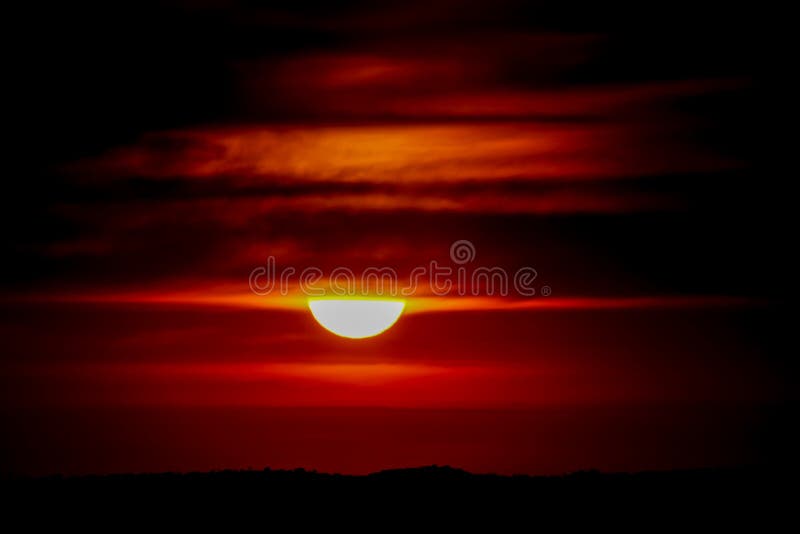 Blood Red Sunset with Dark Clouds Stock Image - Image of glow, africa ...