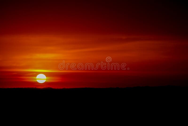 Blood Red Sunsetlight on the Sky, Sun at Horizon Stock Photo - Image of ...
