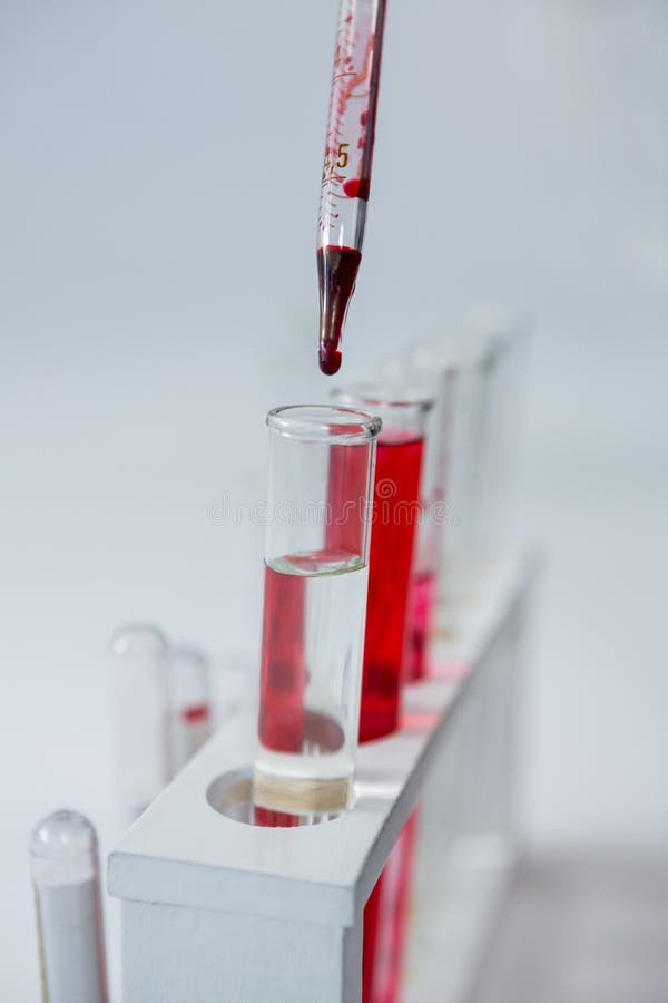 Blood Sample Being Drop into Test Tubes Stock Image - Image of ...