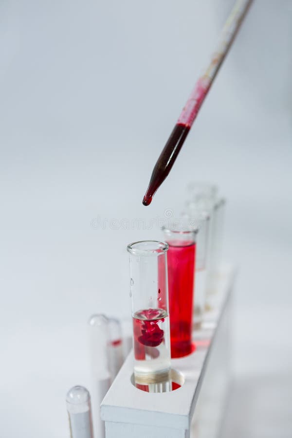 Blood Sample Being Drop into Test Tubes Stock Image - Image of ...