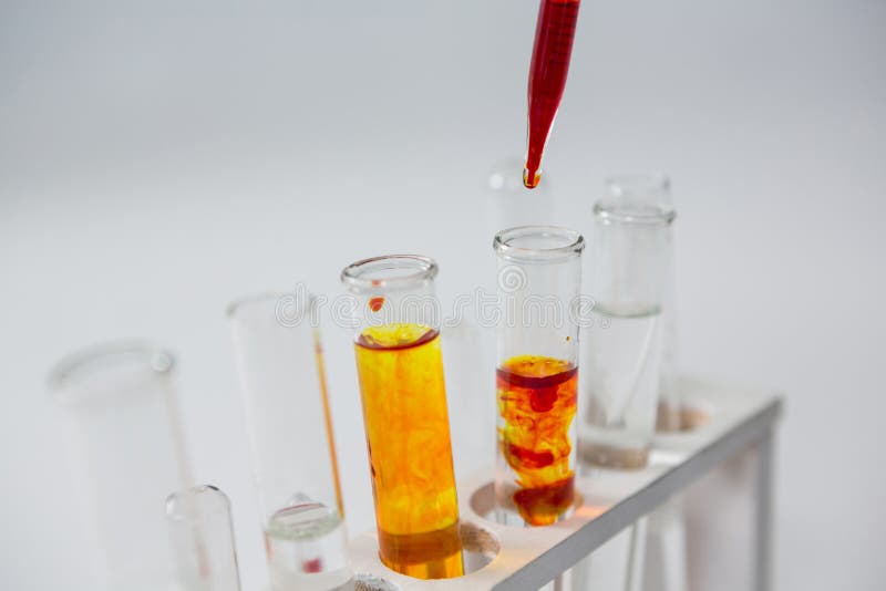 Blood Sample Being Drop into Test Tubes Stock Photo - Image of ...