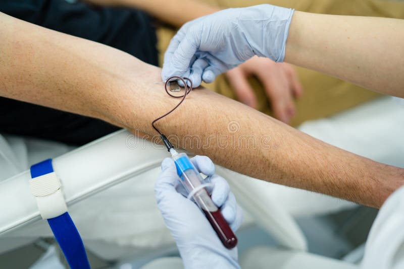 Blood Sampling from a Man in a Test Tube from a Vein Stock Photo ...