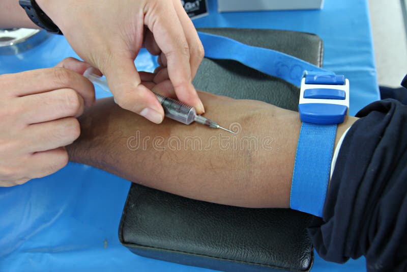 Blood sampling to check. stock image. Image of nurse - 35690629