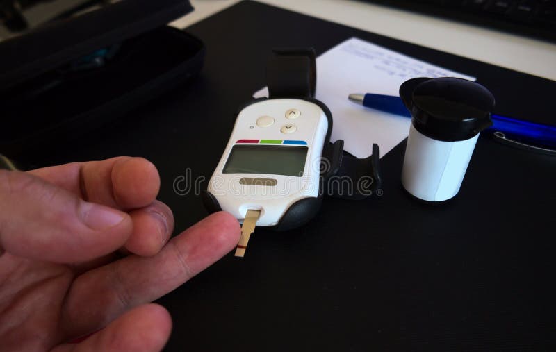 Blood Sugar Check Using Blood Sugar Test Strips Stock Photo - Image of ...