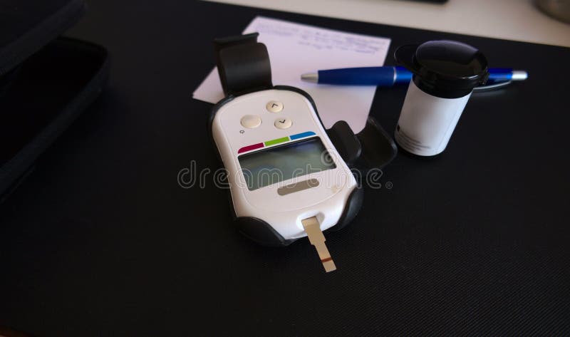 Blood Sugar Check Using Blood Sugar Test Strips Stock Photo - Image of ...
