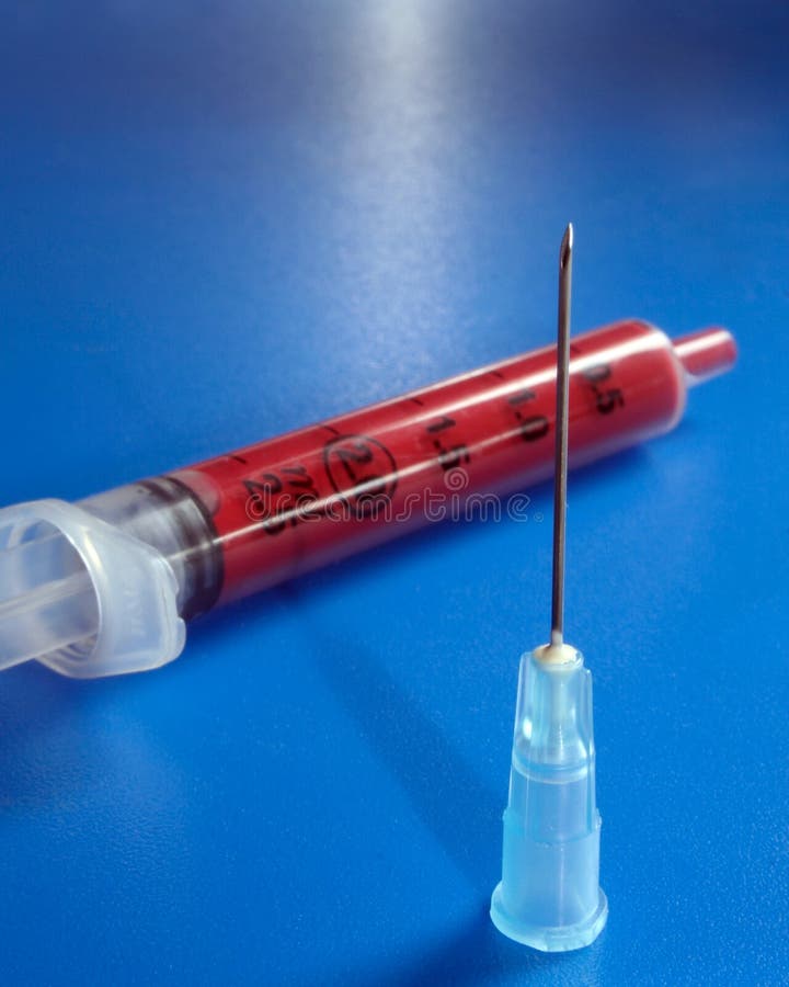 Blood Syringe and Needle stock image. Image of blue, needle - 619725