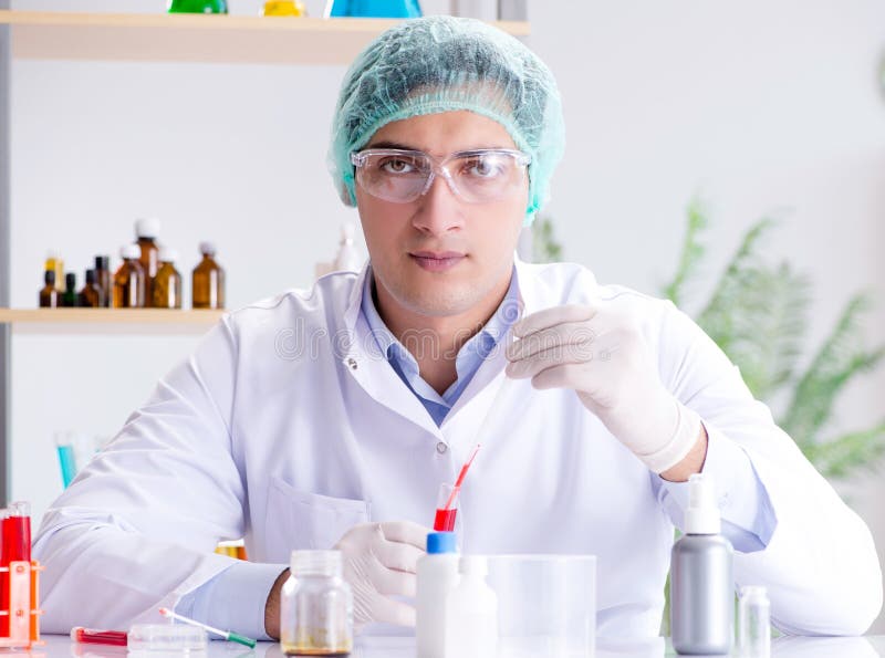 Blood Testing in the Lab with Young Scientist Stock Photo - Image of ...