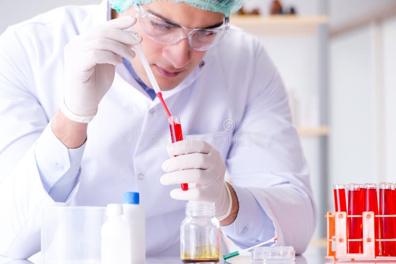 The Blood Testing in the Lab with Young Scientist Stock Photo - Image ...