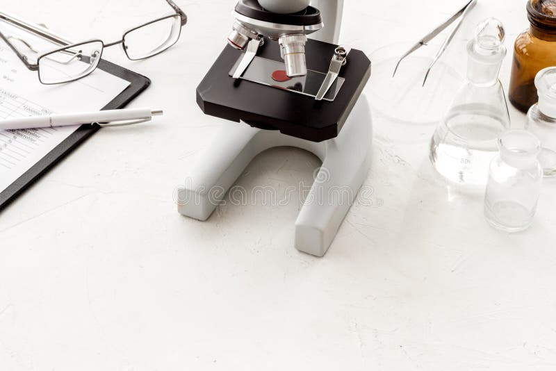 Blood Testing with Microscope in Laboratory. Equipment on White ...