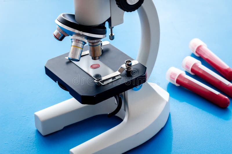 Blood Testing. Samples Viewing Undermicroscope on Blue Background Top ...