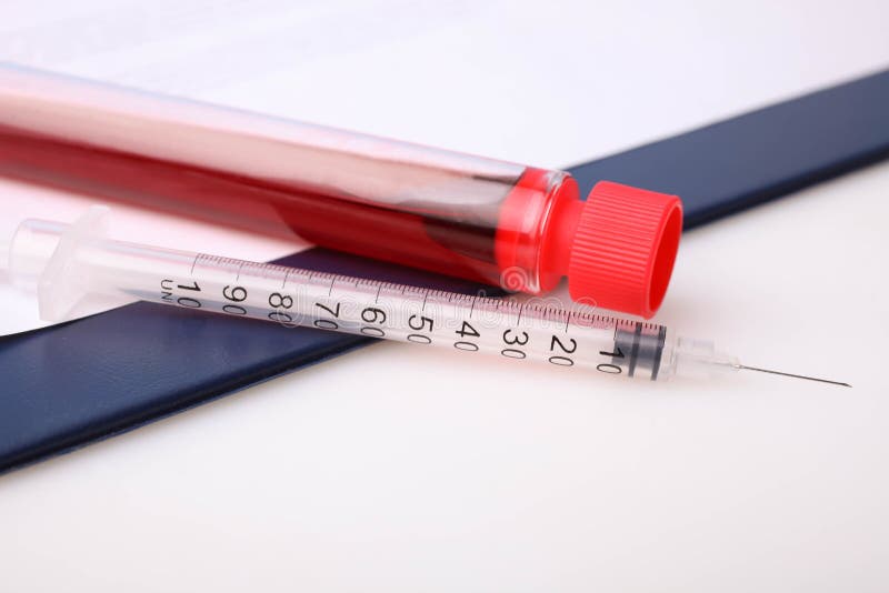 Blood Tube and Insulin Syringe Stock Photo - Image of paper, medical ...