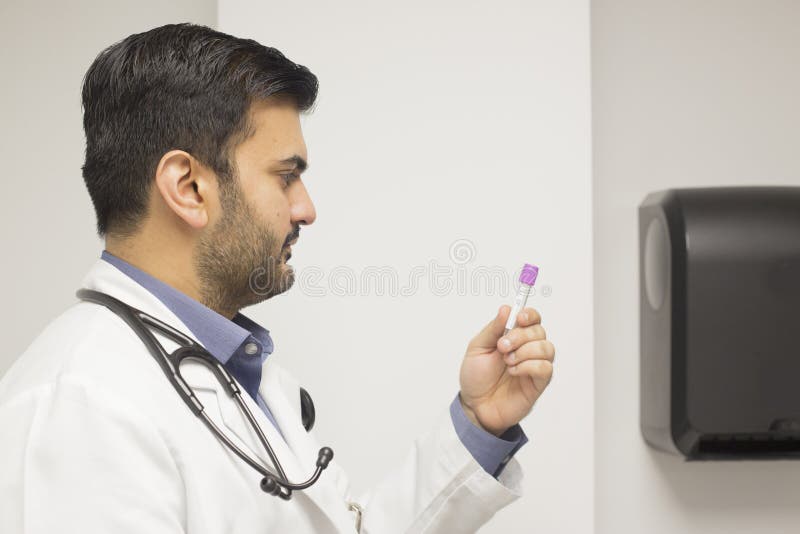 Blood work tubes editorial image. Image of office, person - 134868260