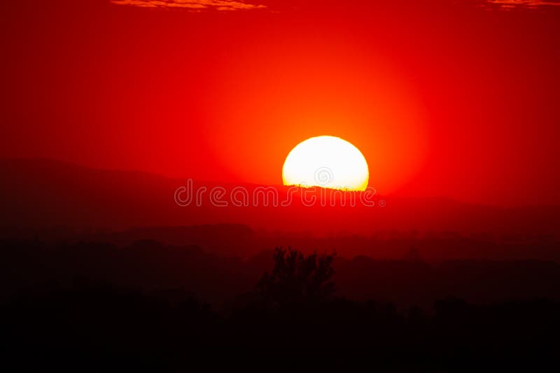A Bloody Sunset Over the Fields. Stock Photo - Image of visible, sunset ...