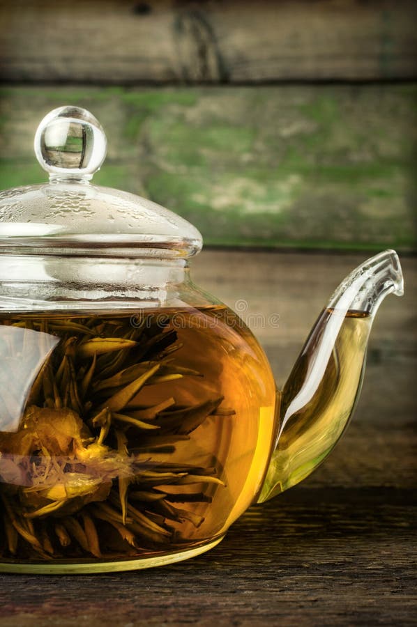 Blooming Green Tea In Glass Teapot Stock Photo - Image of leaf, relax ...