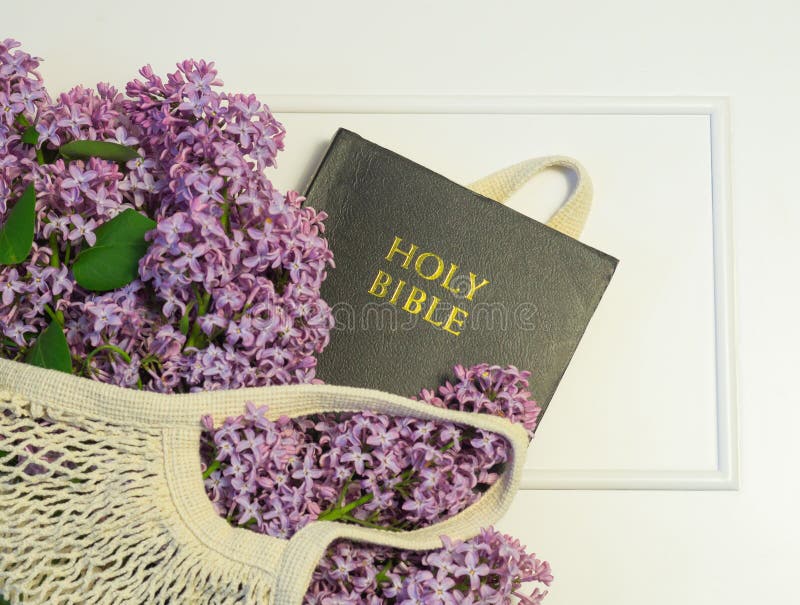 Blooming Spring Lilac Flowers in String Bag with Bible. Spring ...