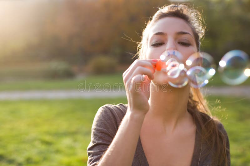 Blowing Bubbles into the Wind. Stock Image - Image of anture, blowing ...