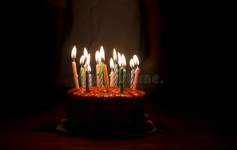 Blowing Light on Birthday Cake Celebration in Darkness Stock Image ...